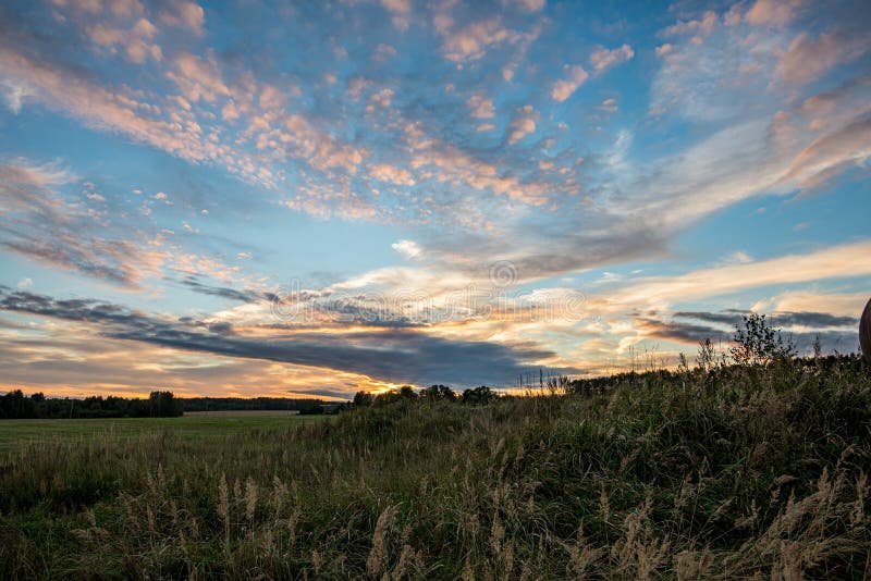 Dramatic Dark Red Clouds in Sunset Over Countryside Fields and Forests ...
