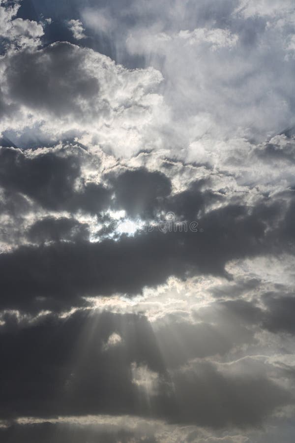 Dramatic Dark Sky with Sun Rays Breaking through the Clouds Stock Photo ...