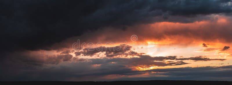 Dramatic Dark Sunset. Panorama of Dark Rain Clouds in the Evening Stock ...
