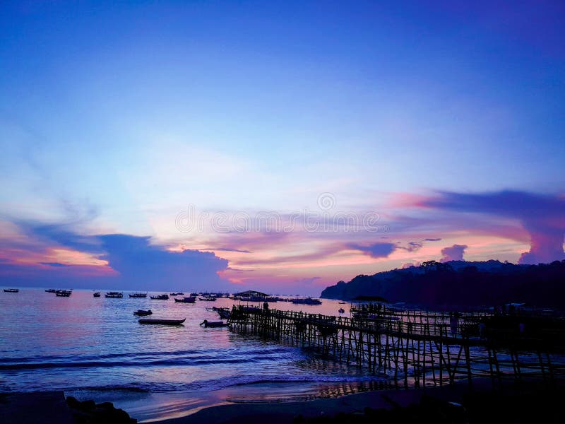 Dawn view on the beach stock image. Image of dramaticsky - 207595077