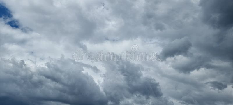 Dramatic Dense Clouds Covers the Blue Skies Stock Photo - Image of ...