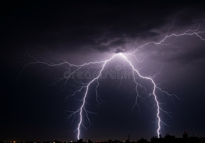 A Dramatic Display of Lightning Strikes in the Night Sky. Two Main ...