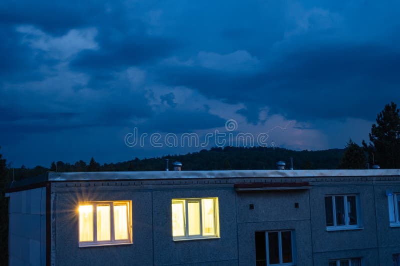 Stormy Evening Sky with Lightning Over Residential Building Stock Image ...