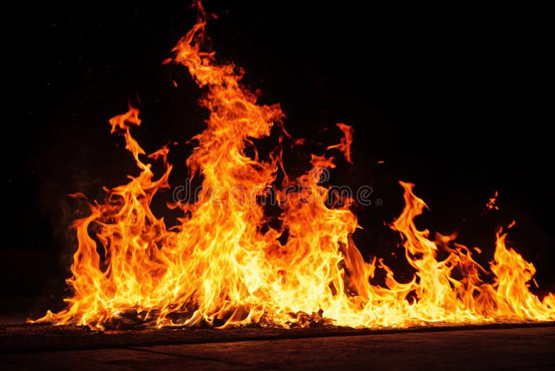 Dramatic Fire Flames Against a Black Background Stock Illustration ...