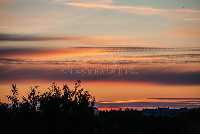 Dramatic High Contrast Clouds in Sunset Over Seaside Beach Stock Image ...