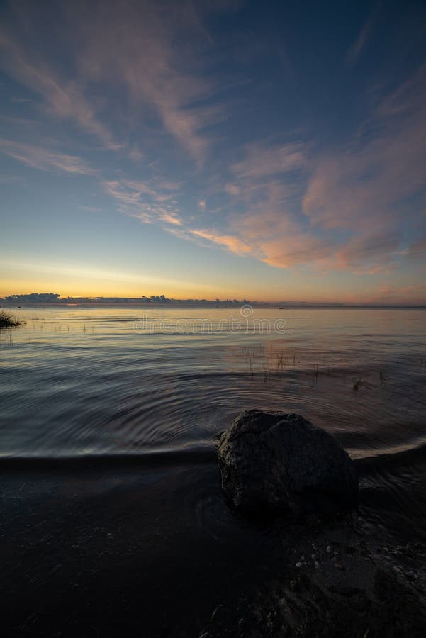 Dramatic High Contrast Clouds in Sunset Over Seaside Beach Stock Image ...