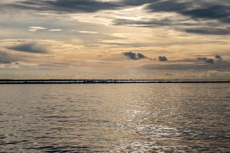 Dramatic High Contrast Clouds in Sunset Over Seaside Beach Stock Photo ...
