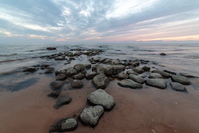 Dramatic High Contrast Clouds in Sunset Over Seaside Beach Stock Image ...