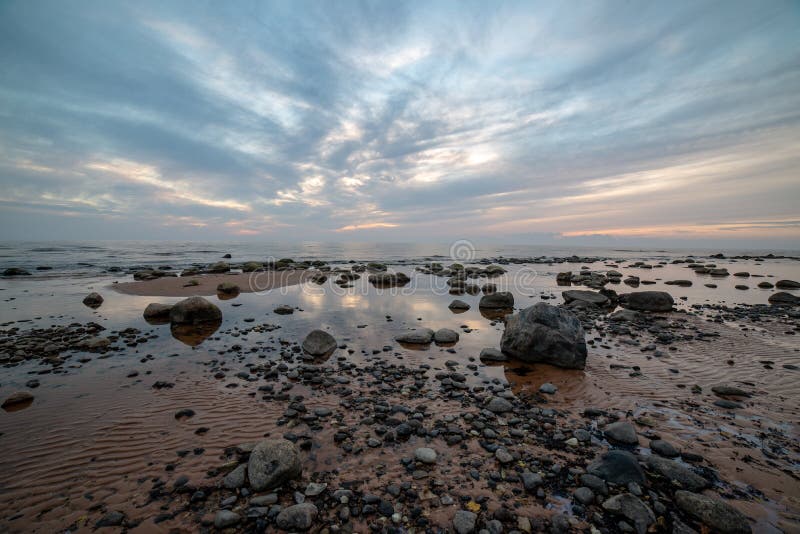 Dramatic High Contrast Clouds in Sunset Over Seaside Beach Stock Image ...