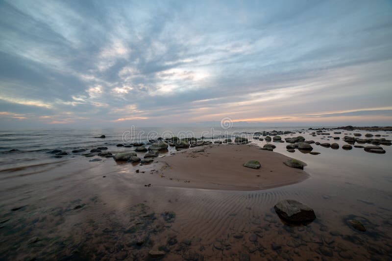 Dramatic High Contrast Clouds in Sunset Over Seaside Beach Stock Photo ...
