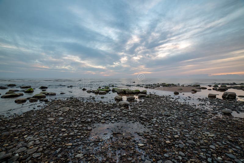 Dramatic High Contrast Clouds in Sunset Over Seaside Beach Stock Photo ...