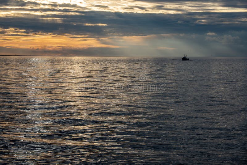 Dramatic High Contrast Clouds in Sunset Over Seaside Beach Stock Photo ...