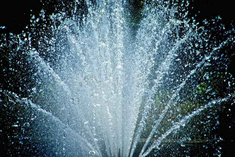 Dramatic Image of Fan Shaped Water Fountain Stock Image - Image of ...