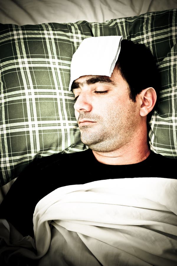 Dramatic Image of a Sick Man in Bed with Fever Stock Image - Image of ...