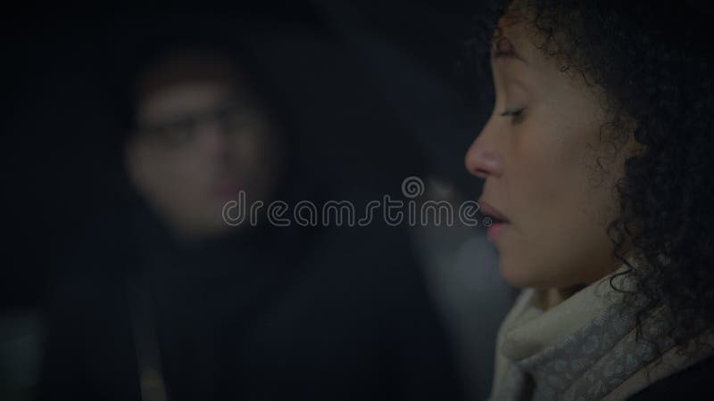 A Dramatic and Intense Dialogue Happening Under an Umbrella in the ...