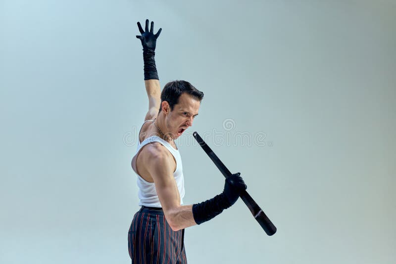 Dramatic Intensity Captured in Movement, Raised Hand and Sharp ...