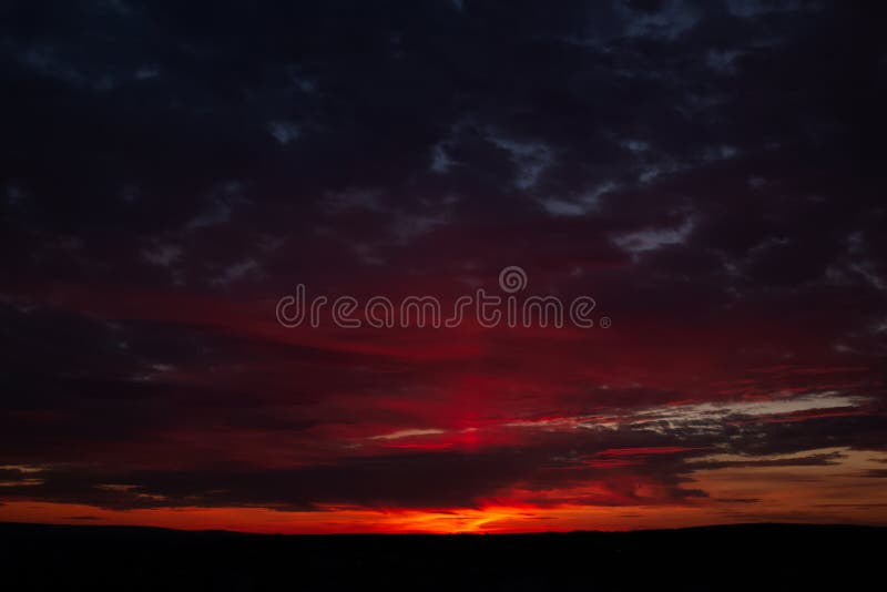 Dramatic Landscape of Beautiful Sunset with Dark Clouds. Stock Photo ...