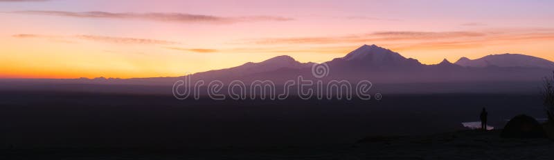 Dramatic Light with Silhouette of Mountains during Sunrise Stock Image ...