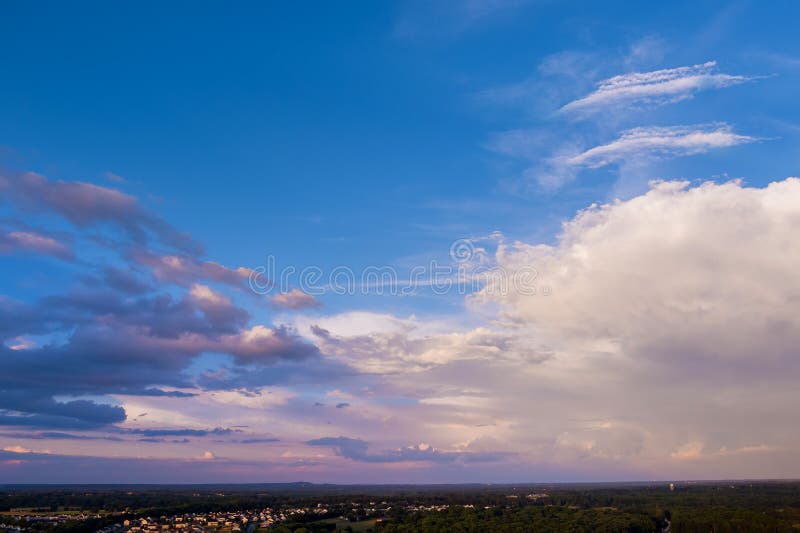 Dramatic Light Sunset of the Sun through the Clouds Stock Image - Image ...