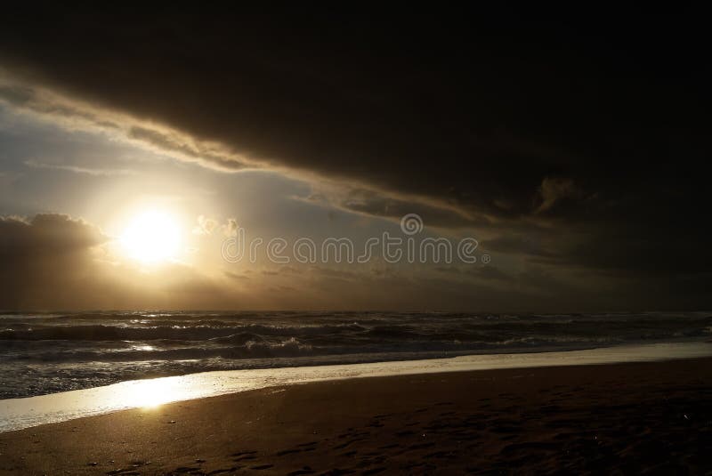 Dramatic lighted beach stock image. Image of dawn, nature - 39245013