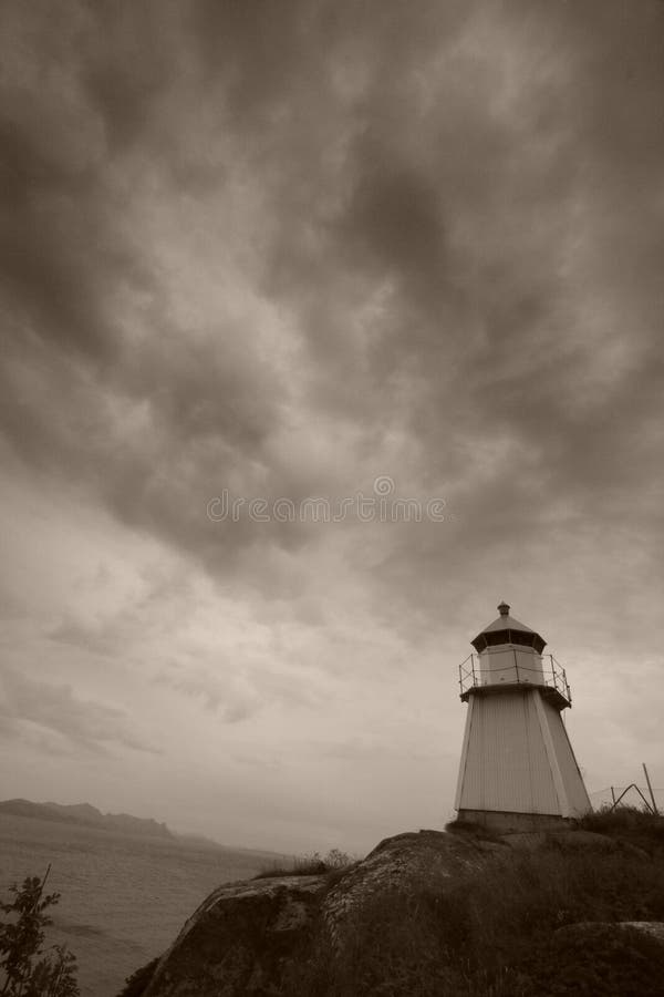 Dramatic lighthouse stock image. Image of cloud, cloudy - 1481371