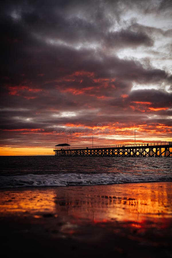 Dramatic Low-angle Sunset Looking Towards the Jetty Stock Photo - Image ...