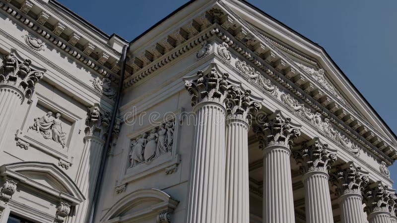 Dramatic Low Angle View of Neoclassical Building with Ornate Columns ...
