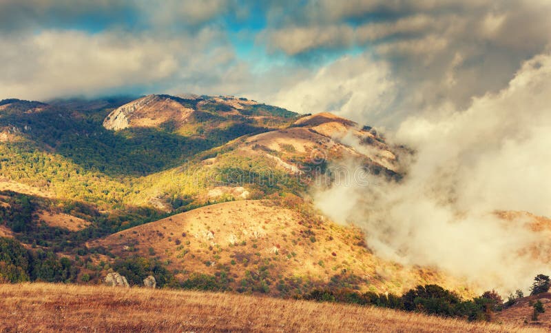 Dramatic Mountain Autumn Landscape at Sunset. Low Clouds Stock Photo ...