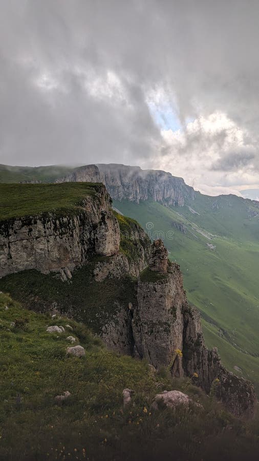 Dramatic Mountain Landscape with Cliffs and Clouds Stock Image - Image ...