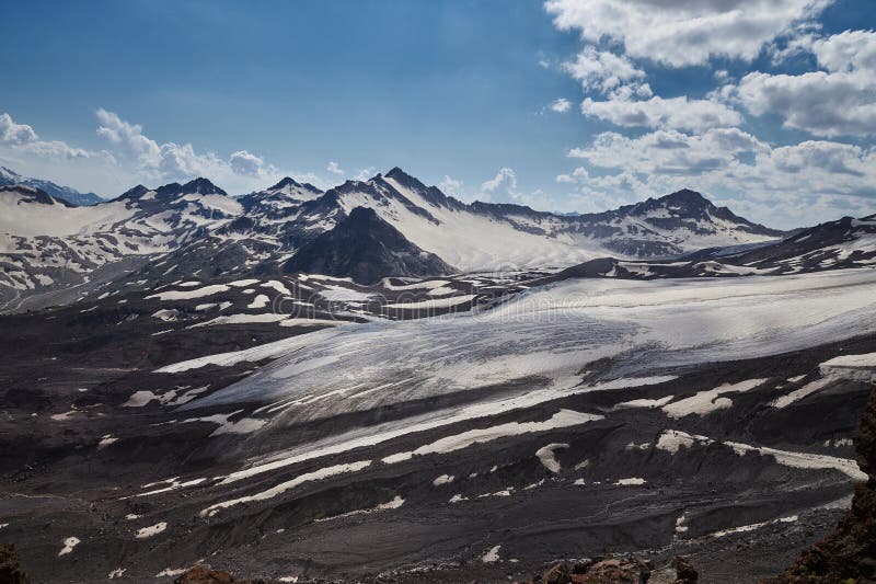 Dramatic Mountain Terrain Features Rugged Peaks and Expansive Glaciers ...