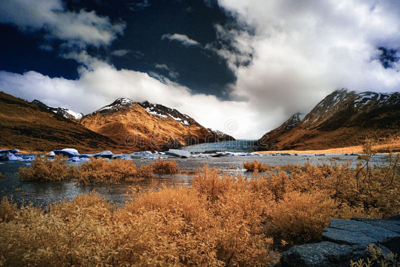 Dramatic Mountain Valley Landscape with River and Clouds. Stock Image ...