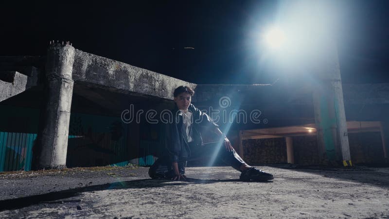 Dramatic Night Pose in Abandoned Parking Structure Stock Footage ...