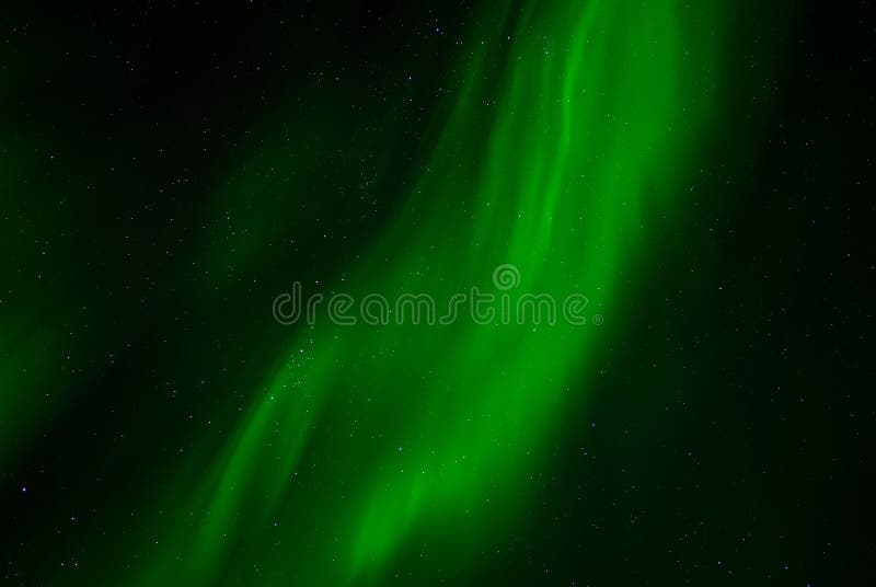 Dramatic Night Sky Featuring Deep Emerald Green Northern Lights in ...