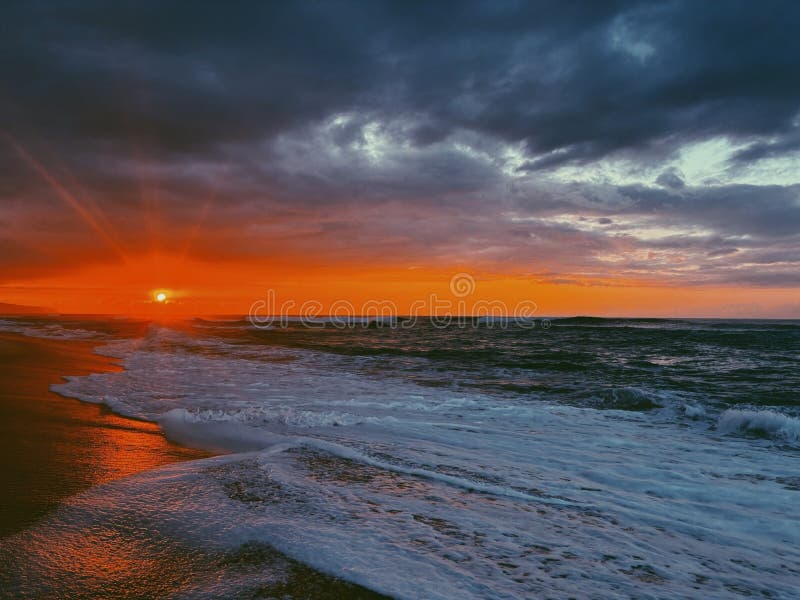 Dramatic Ocean Sunset with Waves Stock Image - Image of ocean, glow ...
