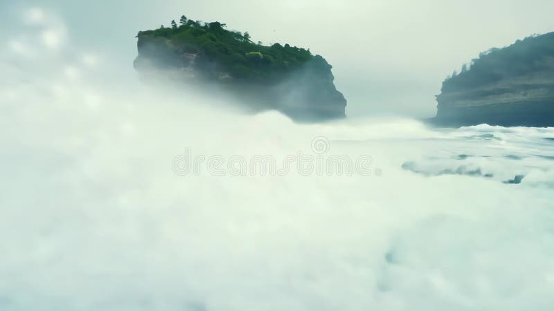 Dramatic Ocean Waves Against Misty Islands, Captured in Low-key ...