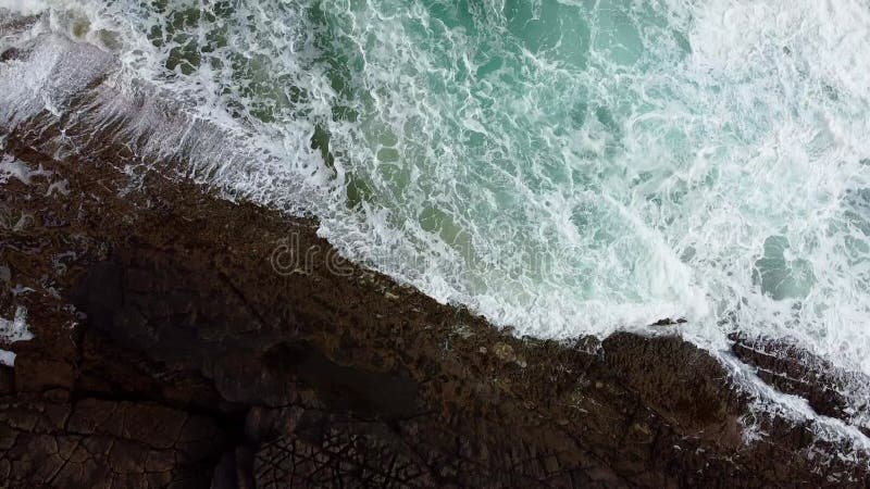 Dramatic Ocean Waves Breaking on Cliff Rocks Shot Top Down Drone Angle ...