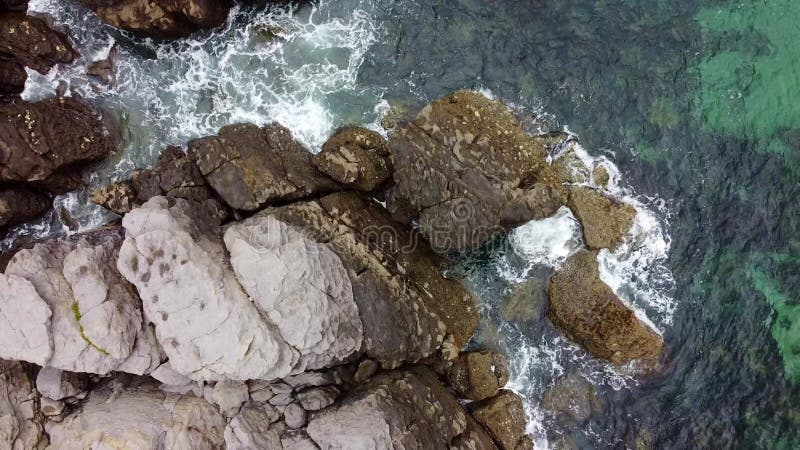 Dramatic Ocean Waves Breaking on Cliff Rocks Shot Top Down Drone Angle ...