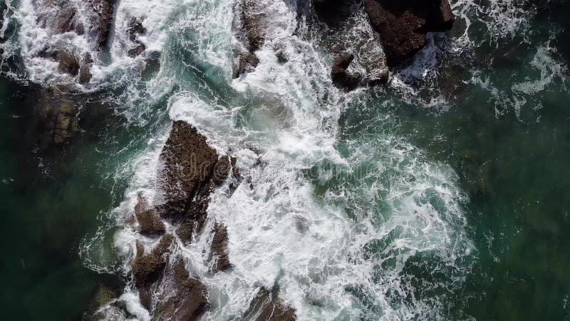 Dramatic Ocean Waves Breaking on Cliff Rocks Shot Top Down Drone Angle ...