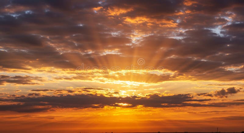 Dramatic Orange and Yellow Sunset Sky with Sun Rays Stock Photo - Image ...