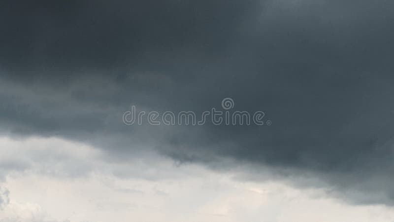 A Dramatic, Overcast Sky with a Single Beam of Sunlight Piercing through the Clouds. the Dark ...