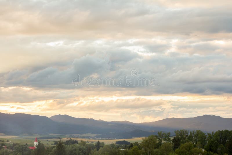 Dramatic Overcast Sky Sunset in Mountains Stock Image - Image of ...