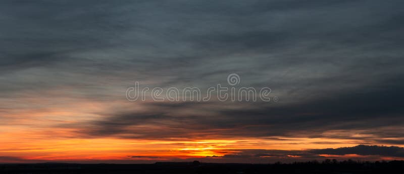 Dramatic Panorama of Bright Saturated Sunset with Many Dark Clouds ...