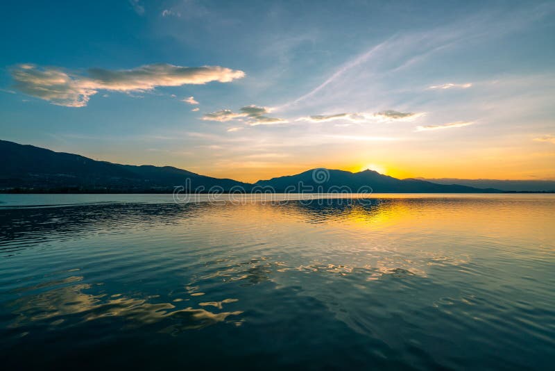 Dramatic Panorama Evening Sky and Clouds Over Lake at Sunset Stock ...
