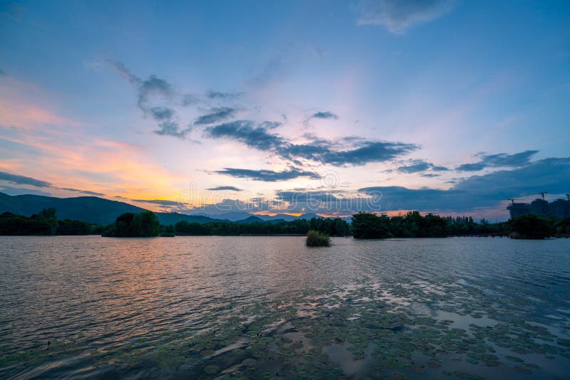 Dramatic Panorama Evening Sky and Clouds Over Mountain and Lake at ...