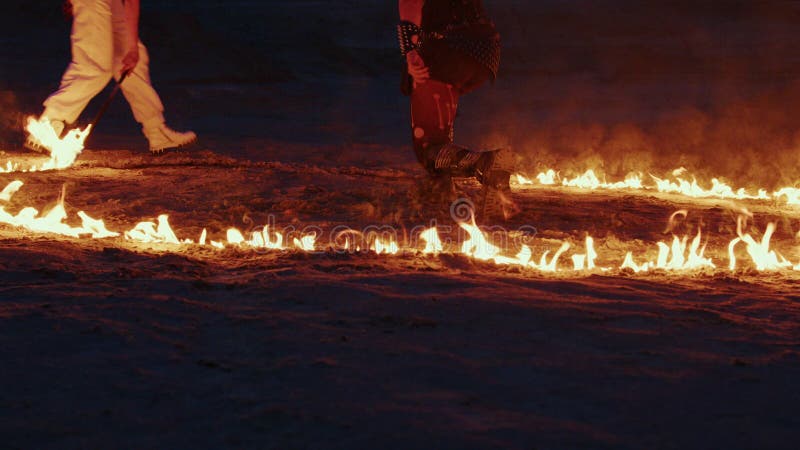Dramatic Performer Walking through Circle of Fire at Night Stock Video ...