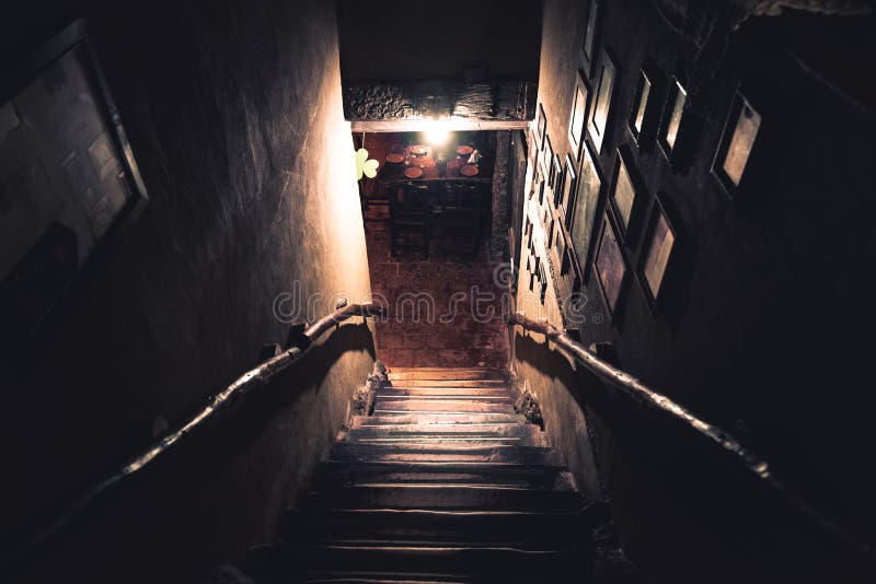 Dramatic Point of View of Scary Stairs from Upside into Darkness of ...