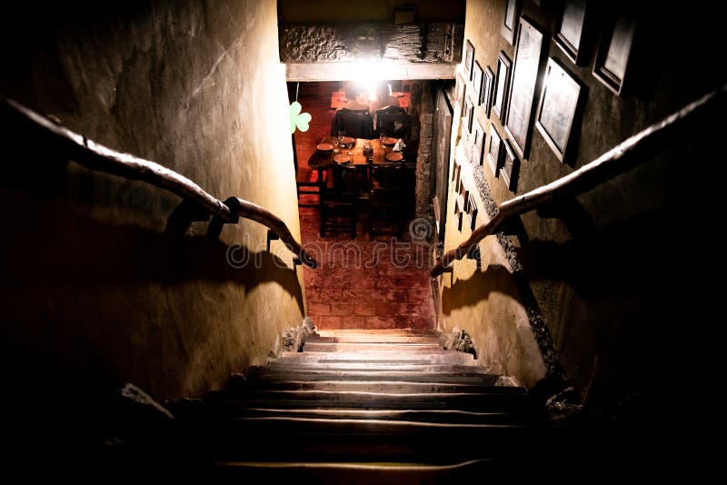 Dramatic Point of View of Scary Stairs from Upside into Darkness of ...