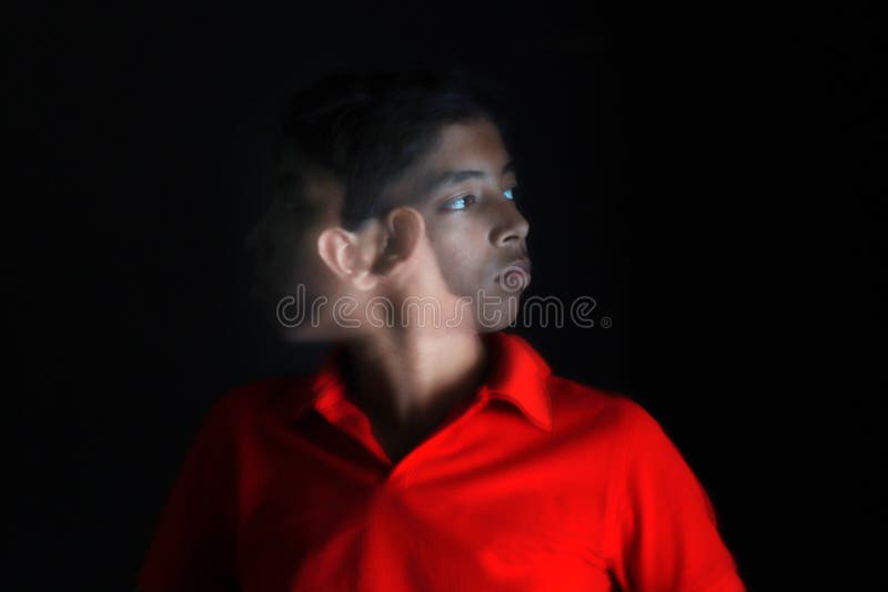 Dramatic Portrait of a Boy. Portrait of a Sad Boy. Slow Shutter Speed ...