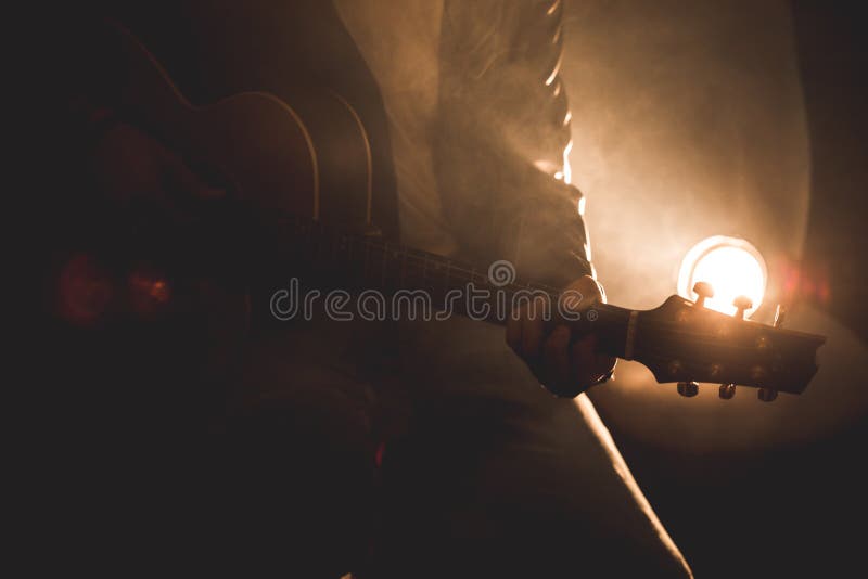 Dramatic Portrait of a Man Playing a Guitar. Guitarist Stock Photo ...