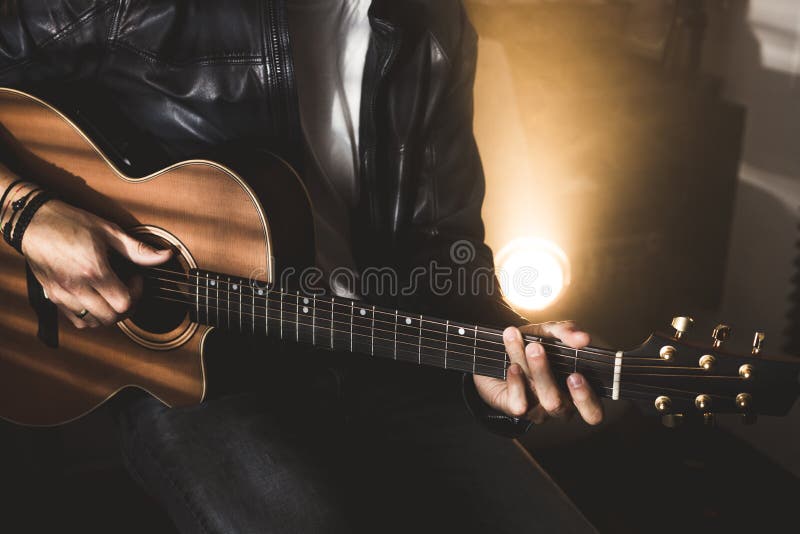 Dramatic Portrait of a Man Playing a Guitar. Guitarist Stock Image ...